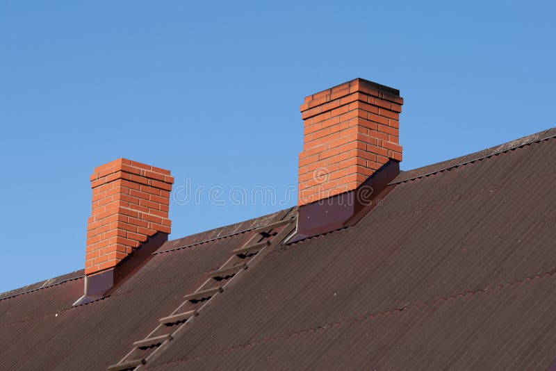 Roof with Ventilation, Flue Terminal and Chimney Stock Photo - Image of ...