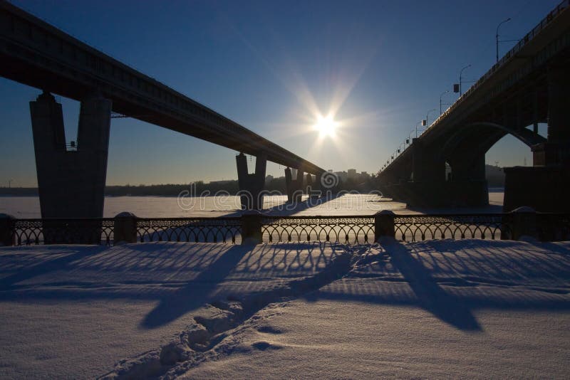 Two bridges and sun stock photo. Image of seasons, snow - 17936432