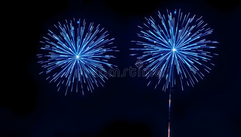 Two Brilliant Blue Fireworks Exploding Against a Black Night Sky Stock ...