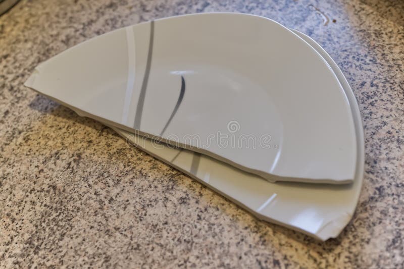 Broken Ceramic Plates on Granite Countertop Stock Image - Image of ...