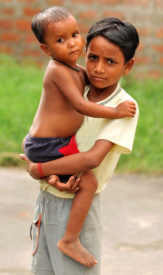 Two brothers stock image. Image of dark, help, poor, playing - 10585989