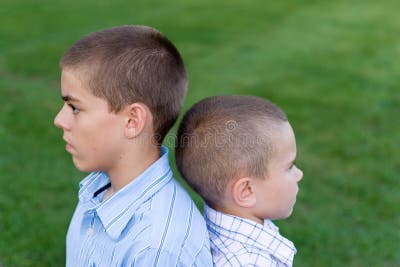 282 Two Kids Sitting Back To Back Stock Photos - Free & Royalty-Free ...
