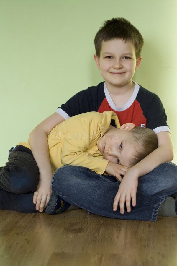 Two brothers stock photo. Image of look, children, help - 533152