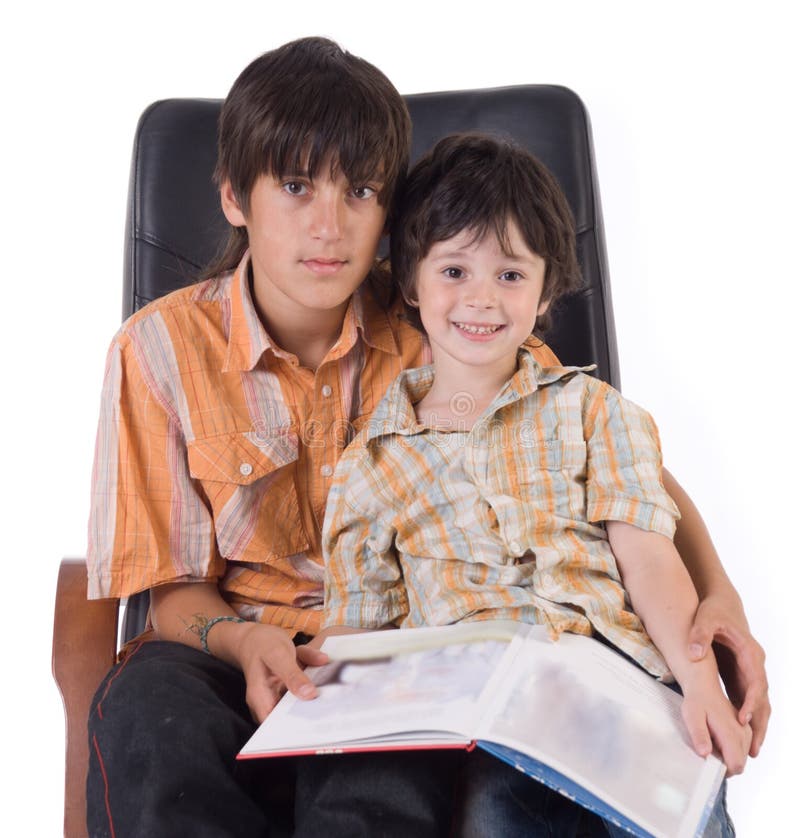 Two brothers with book stock photo. Image of story, friendship - 11301908