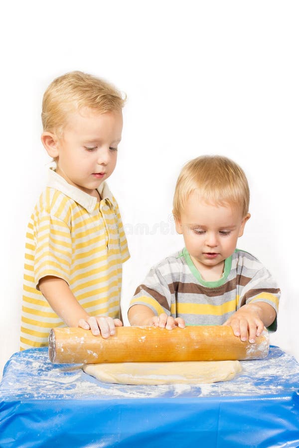 Two Brothers Cook Dough for a Pie Stock Image - Image of rolling, cake ...