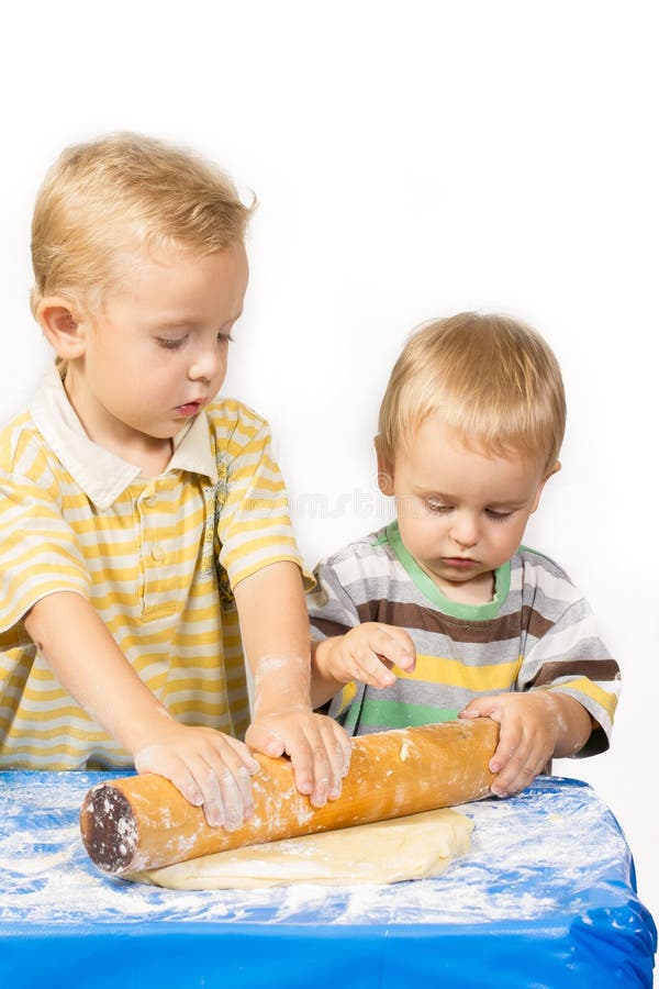Two Brothers Cook Dough for a Pie Stock Image - Image of carefully ...