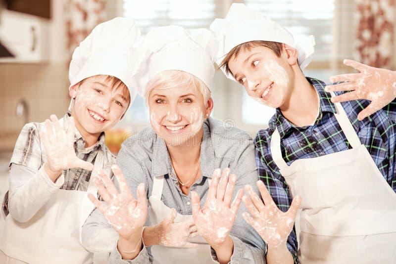 Two brothers in cook hats. stock photo. Image of human - 87239328