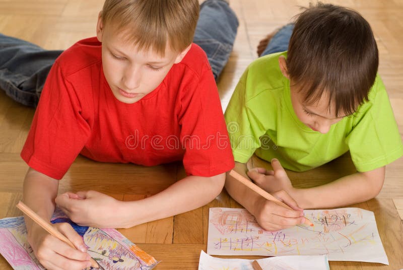 Two brothers draw stock photo. Image of home, education - 15181438