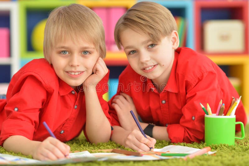 Two Brothers Draws with Pencils Stock Photo - Image of cute, portrait ...