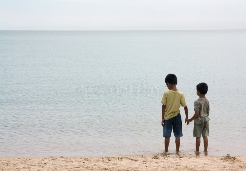 Two Brothers Holding Hands stock image. Image of comfort - 19860405