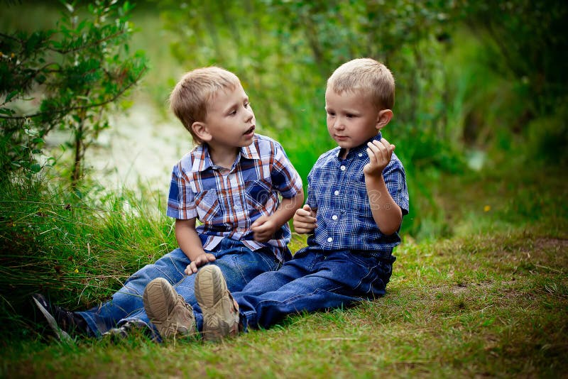 Two Brothers Hugging Each Other Outdoor Stock Photo - Image of relation ...