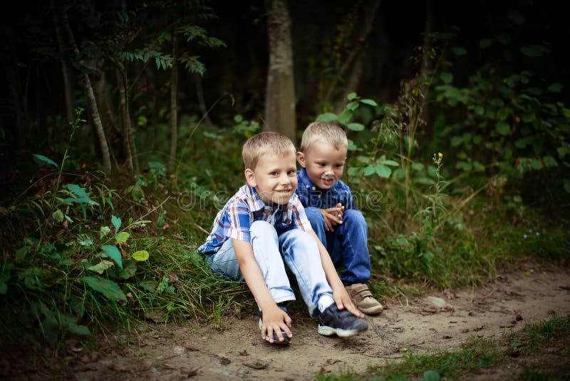 Two Brothers Hugging Each Other Outdoor Stock Image - Image of field ...