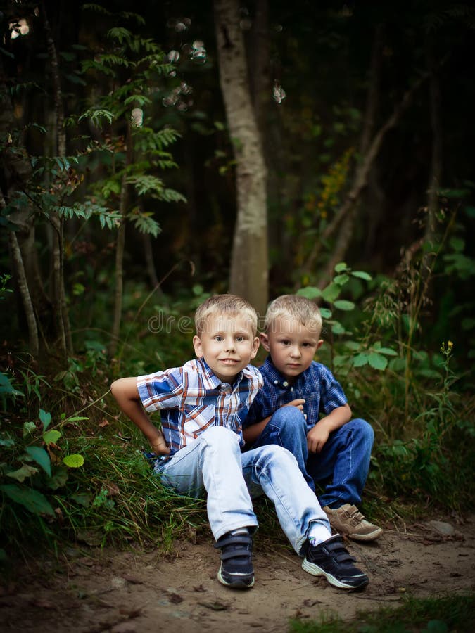 Two Brothers Hugging Each Other Outdoor Stock Image - Image of park ...