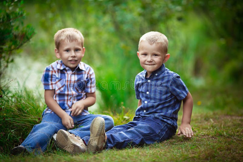 Two Brothers Hugging Each Other Outdoor Stock Image - Image of family ...