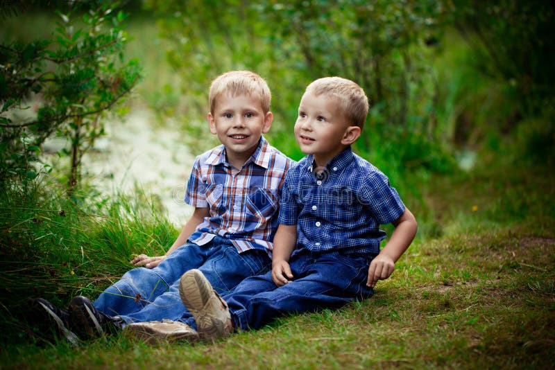 Two Brothers Hugging Each Other Outdoor Stock Image - Image of family ...