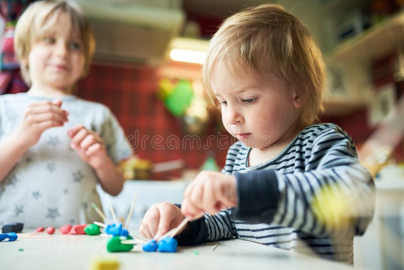 Two Brothers Make Three-dimensional Figures of Plasticine and Sticks ...