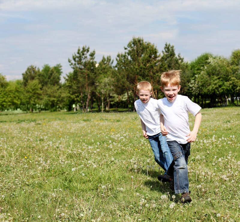 Two brothers outdoors stock image. Image of children - 19794763