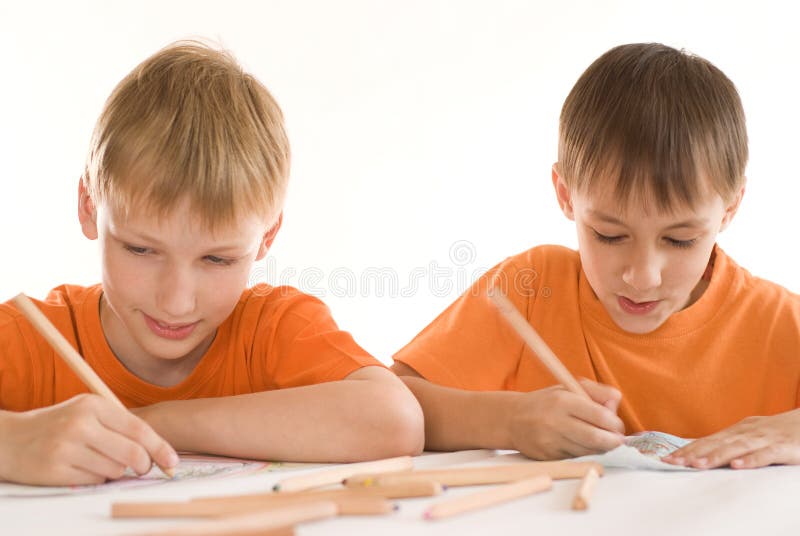 Two brothers draw stock image. Image of looking, child - 16380035