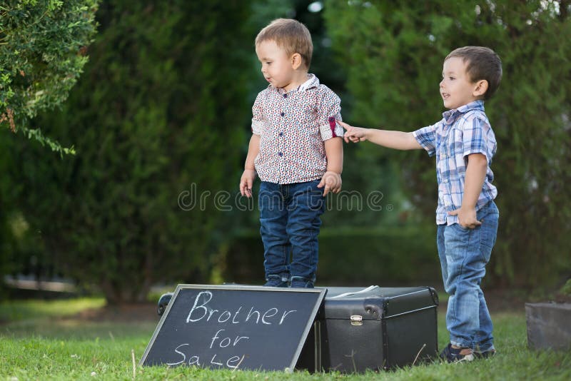 Two Brothers Playing Funny Games Stock Image - Image of children, face ...