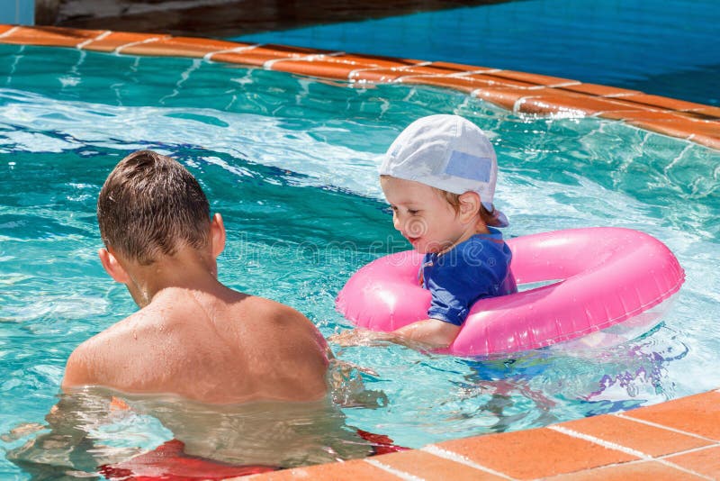 Two Brothers Playing in the Pool Stock Photo - Image of family, child ...