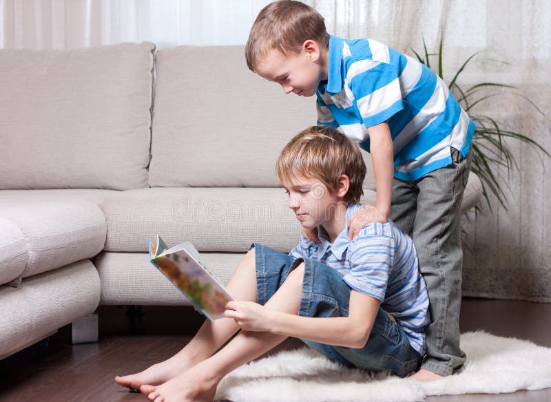 Two Brothers are Reading Books. Stock Image - Image of family, male ...