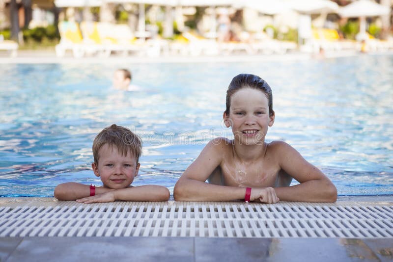 Two Brothers are Resting in the Pool Stock Photo - Image of relax ...