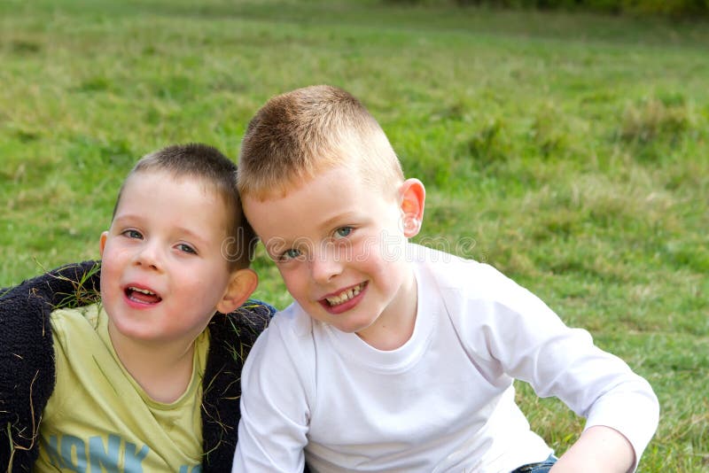 Little Boy Smiling in the Woods Stock Photo - Image of autumn, joyful ...