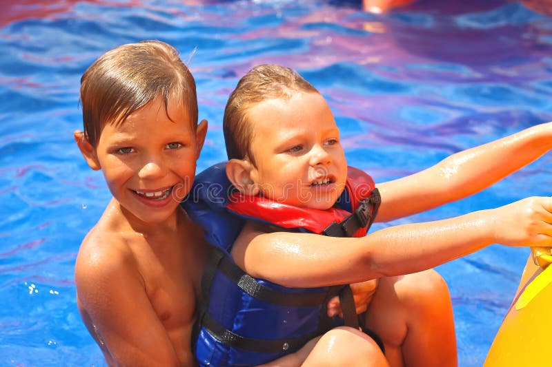 Swimming pool fun stock photo. Image of brothers, young - 814888