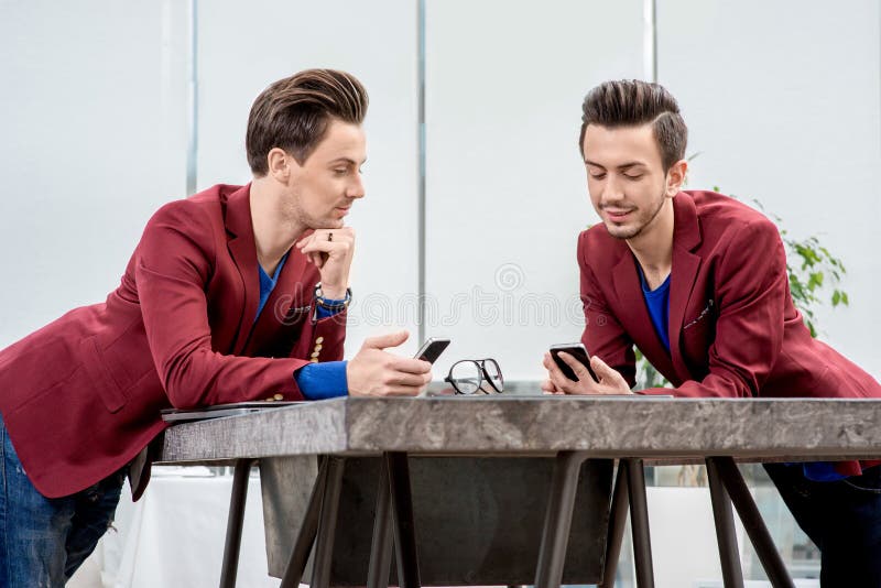Two Brothers Twins Working at the Office Stock Photo - Image of holding ...