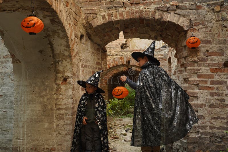 Two Brothers of a Wizard in the Ruins of an Old Castle. Stock Image ...