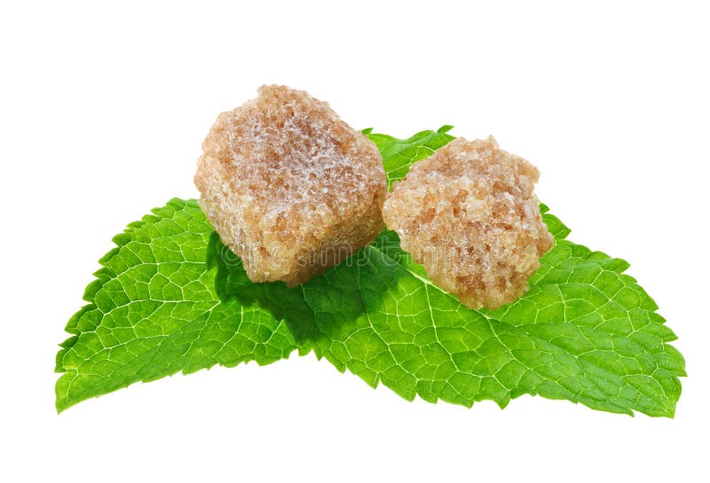 Two Brown Lump Cane Sugar Cubes Over Peppermint Stock Image - Image of ...