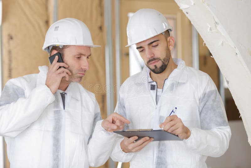 Two Builders Discussing Interior Half Completed House Stock Image ...