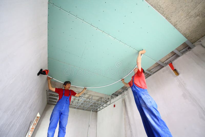 The Builders Set the Ceiling Profile in the New Stock Image - Image of ...