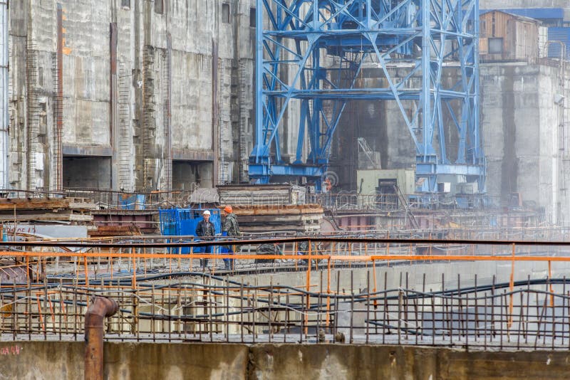 Builders Talk about Blueprints Stock Image - Image of adult, builder ... Builders Talk about Blueprints Stock Image - Image of adult, builder ...