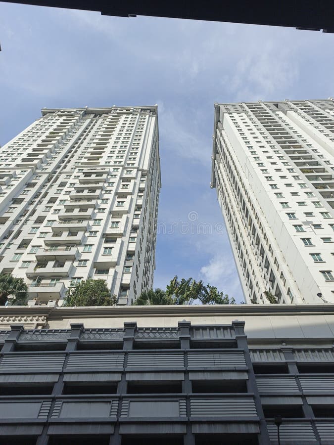 Two building on sunny day stock image. Image of sunny - 351517591