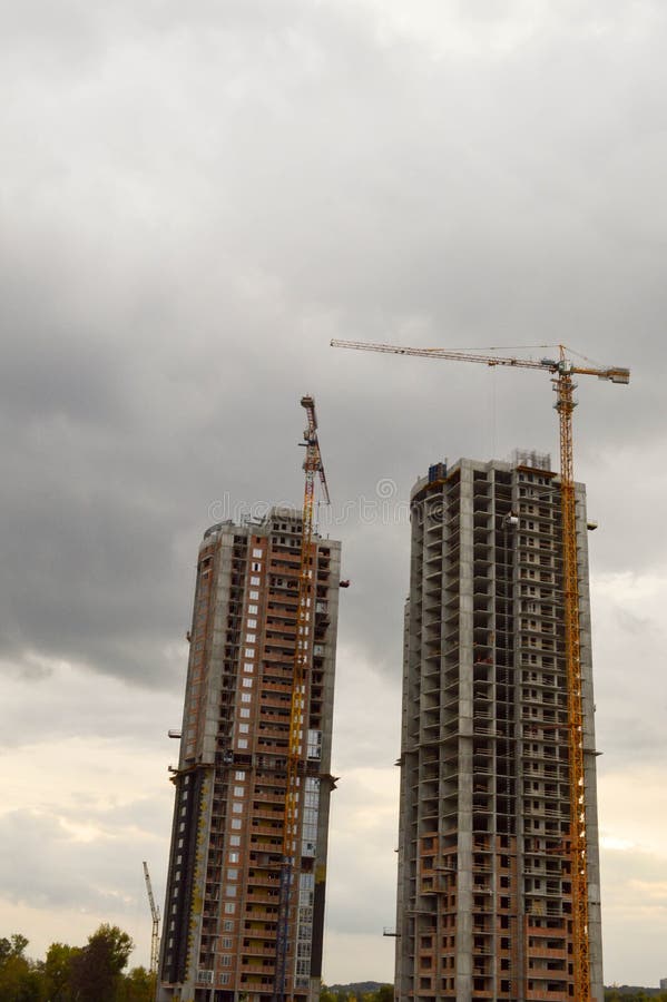 Two Buildings and Two Building Cranes Stock Image - Image of equipment ...