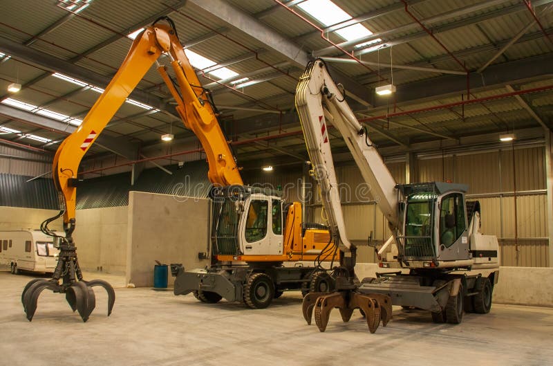Two Bulk Handler Mobile Cranes in a Warehouse Stock Photo - Image of ...