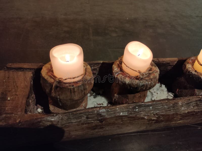 Two Burning Candle Lights in Wooden Case with Amazing Background ...