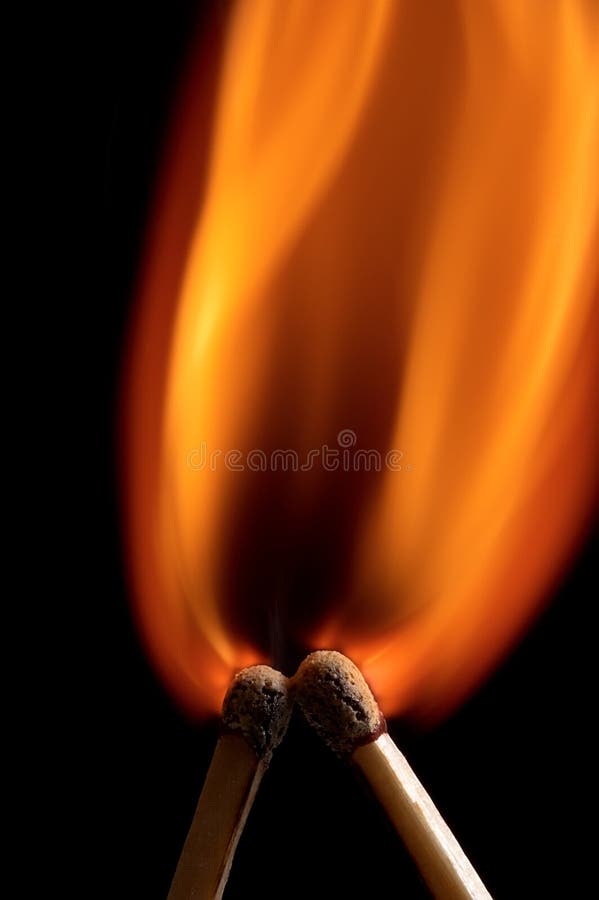 Couple of Matches Burning Together with Heat Flame on a Black ...