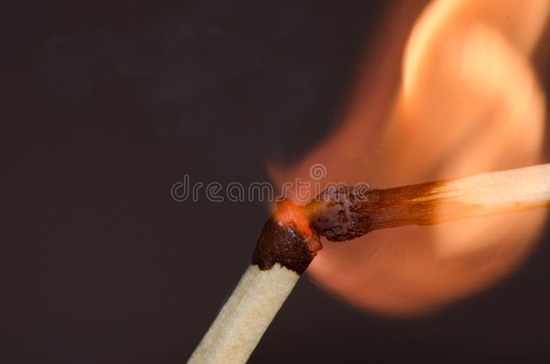 Two burning matches stock image. Image of light, matchstick - 69414899