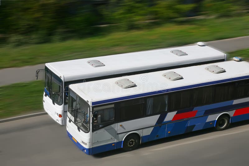 Two Buses Go on City Street Stock Photo - Image of conveyances, europe ...
