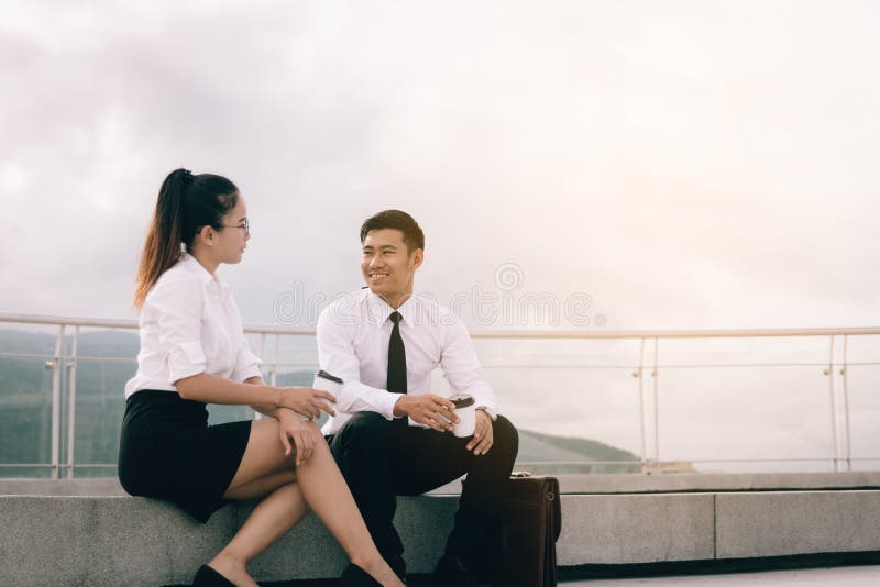 Two Businees People Couple Talking about Work. Stock Image - Image of ...
