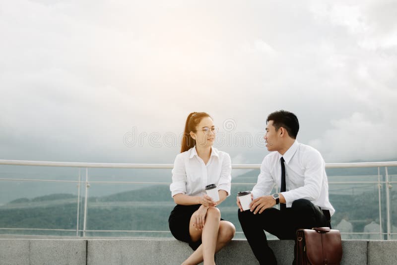 Two Businees People Couple Talking about Work in Morning. Stock Image ...