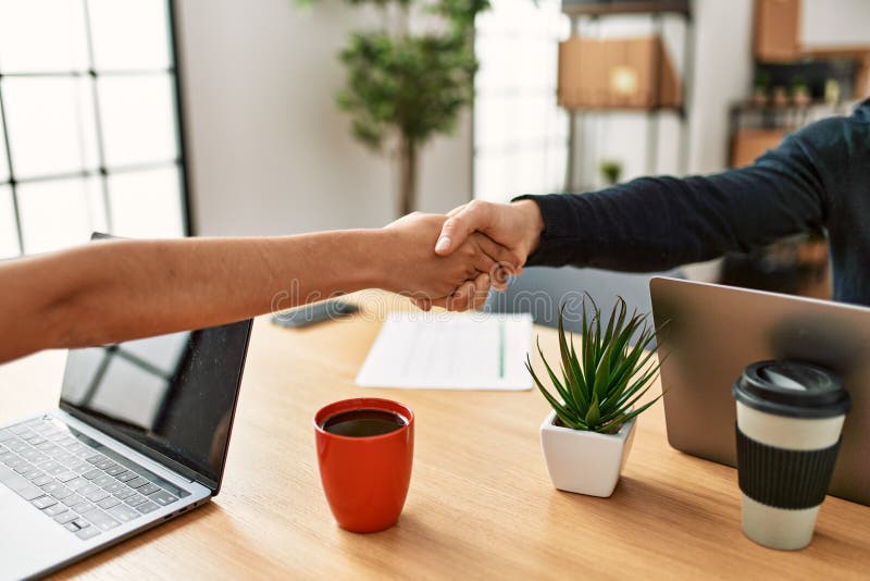 Two Business Arms Shaking Hands at the Office Stock Photo - Image of ...