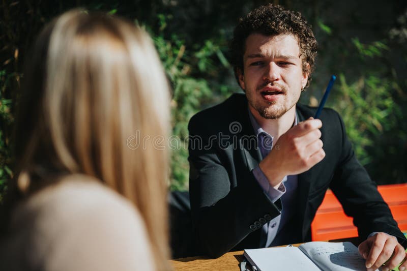 Multicultural Business Meeting Discussion in Outdoor Setting Stock ...