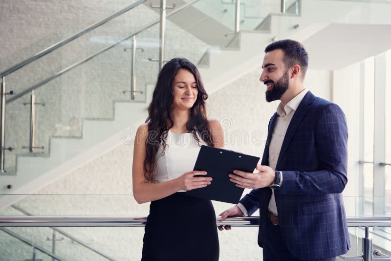 Two Business Colleagues Talk about Work Outside Office. Stock Photo ...