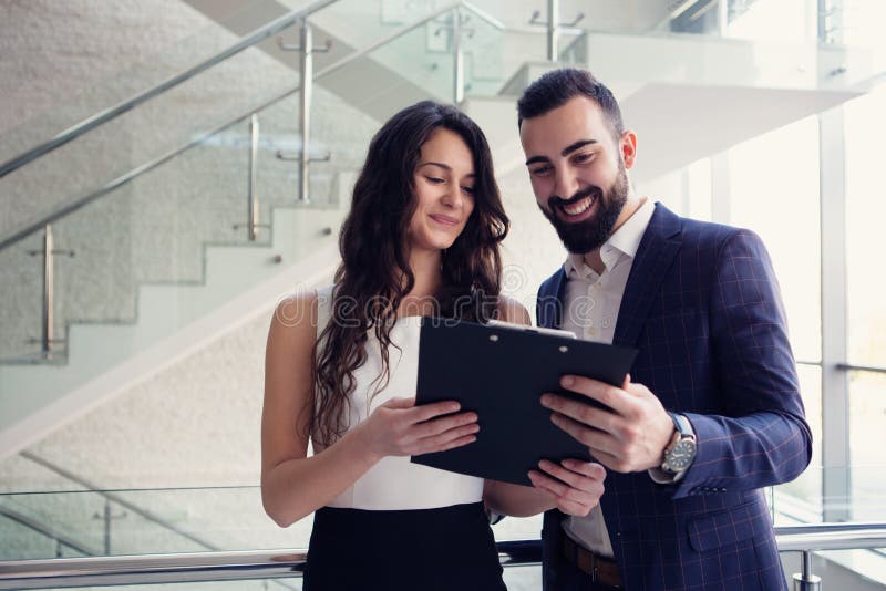 Two Business Colleagues Talk about Work Outside Office. Stock Photo ...