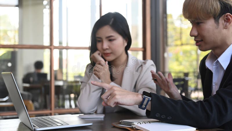 Two Business Colleagues Working, Advising Each Other. Stock Image ...