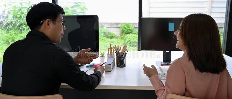 Two Business Colleagues Working Together in Office. Stock Photo - Image ...