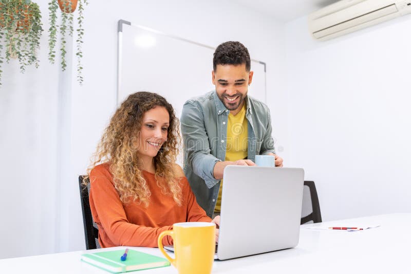 Two Business Colleagues Working Together in the Office. Stock Image ...